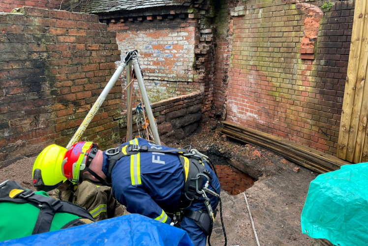 Firefighters rescue man who plunged 30-feet down street well | National ...