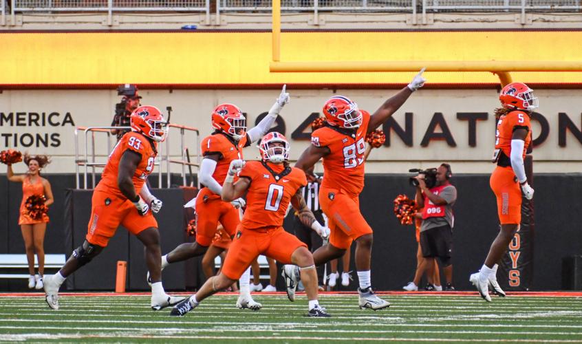 PHOTO GALLERY: Cowboy defense forces three turnovers, holds solid in ...