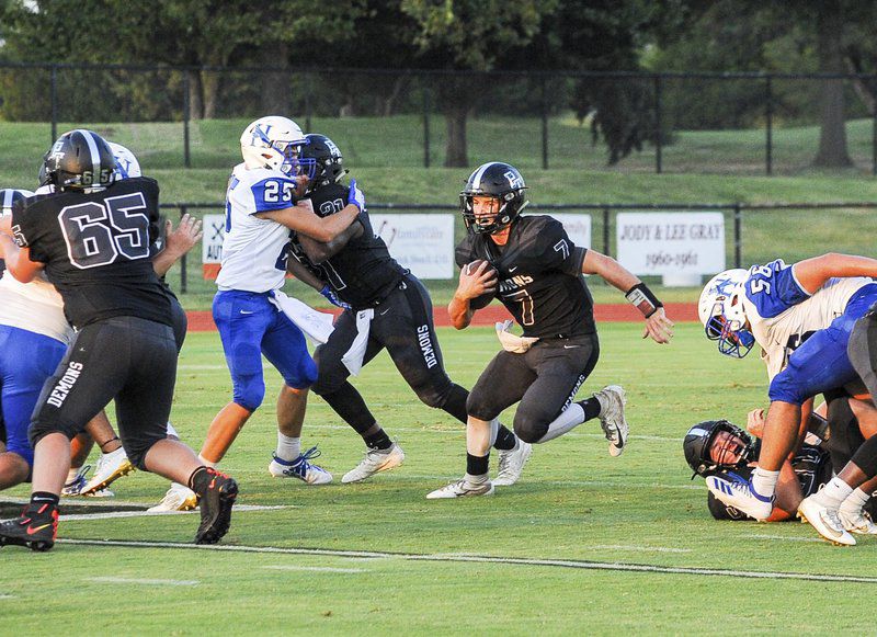 Perkins-Tryon Demons dominate Hennessey | Local Sports | stwnewspress.com