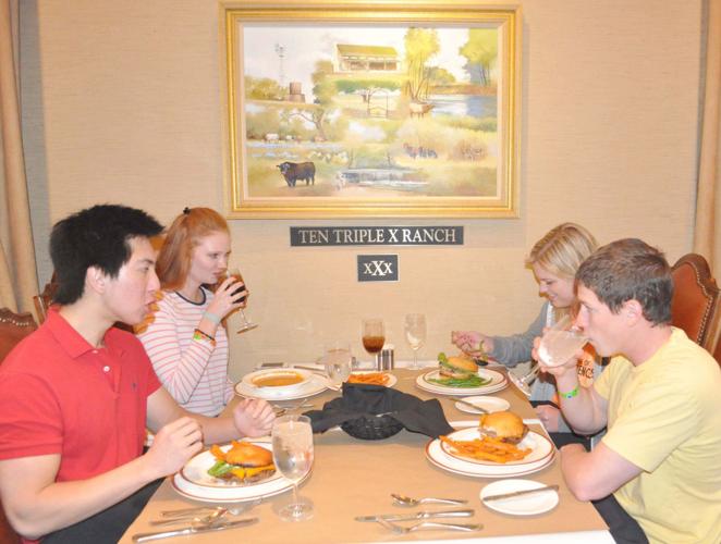The Ranchers Club cowboys up - branding the finest dining in Stillwater ...