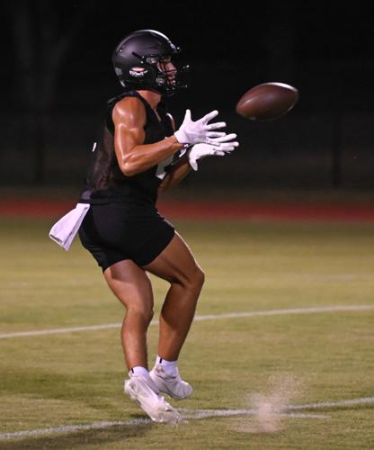 Midnight madness: Perkins-Tryon holds first football practice in the ...