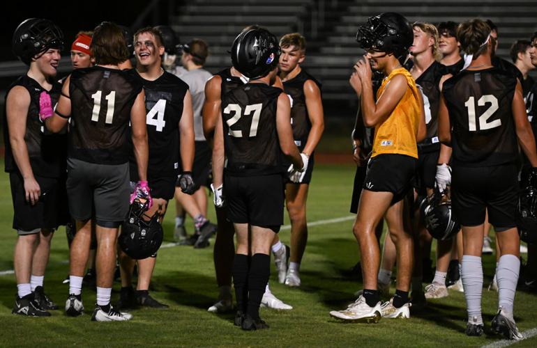 Midnight madness: Perkins-Tryon holds first football practice in the ...