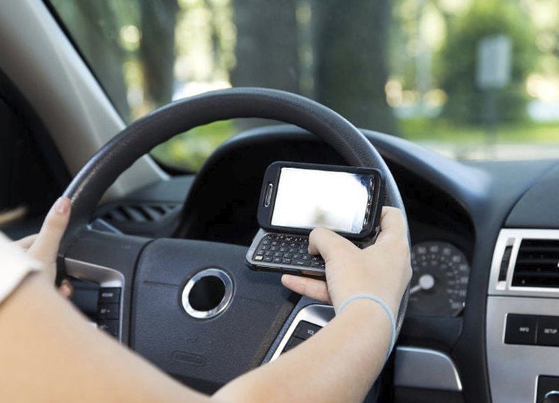 City adopts stricter cell phone use in school, construction zones ...