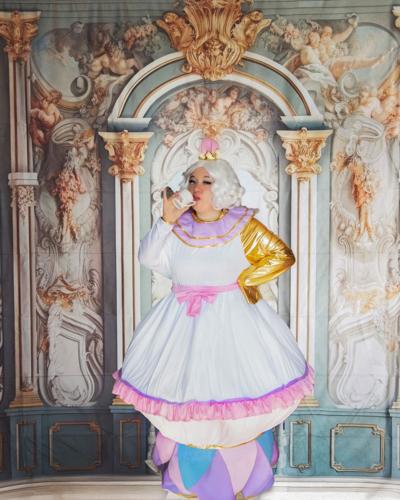Cosplay contest winner models Mrs. Potts from Beauty and the Beast ...