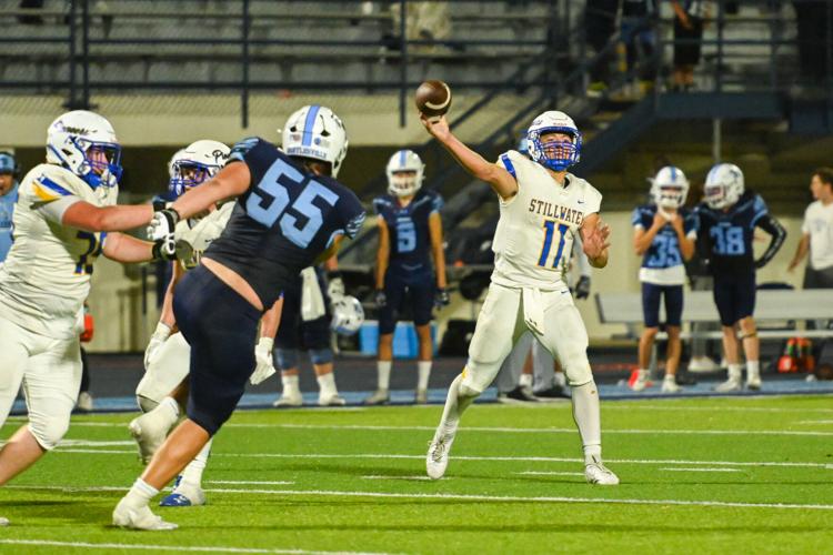 PHOTO GALLERY: Stillwater football fends off district foe Bartlesville ...