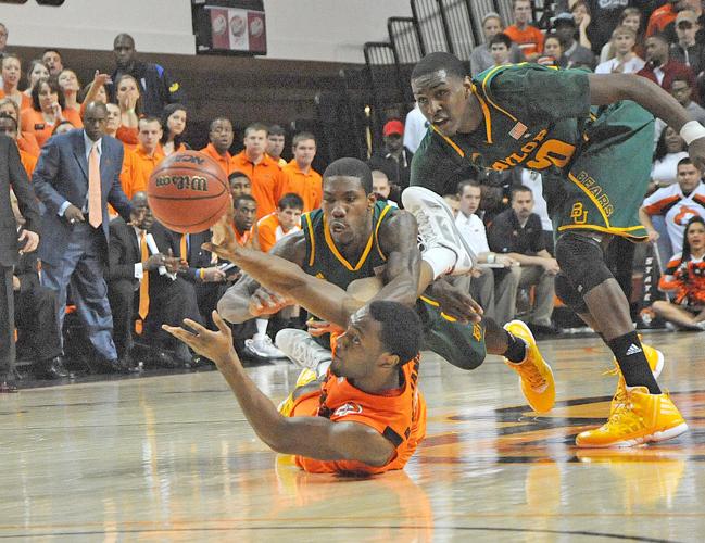Oklahoma State men's basketball player Brian Williams aims to overcome ...