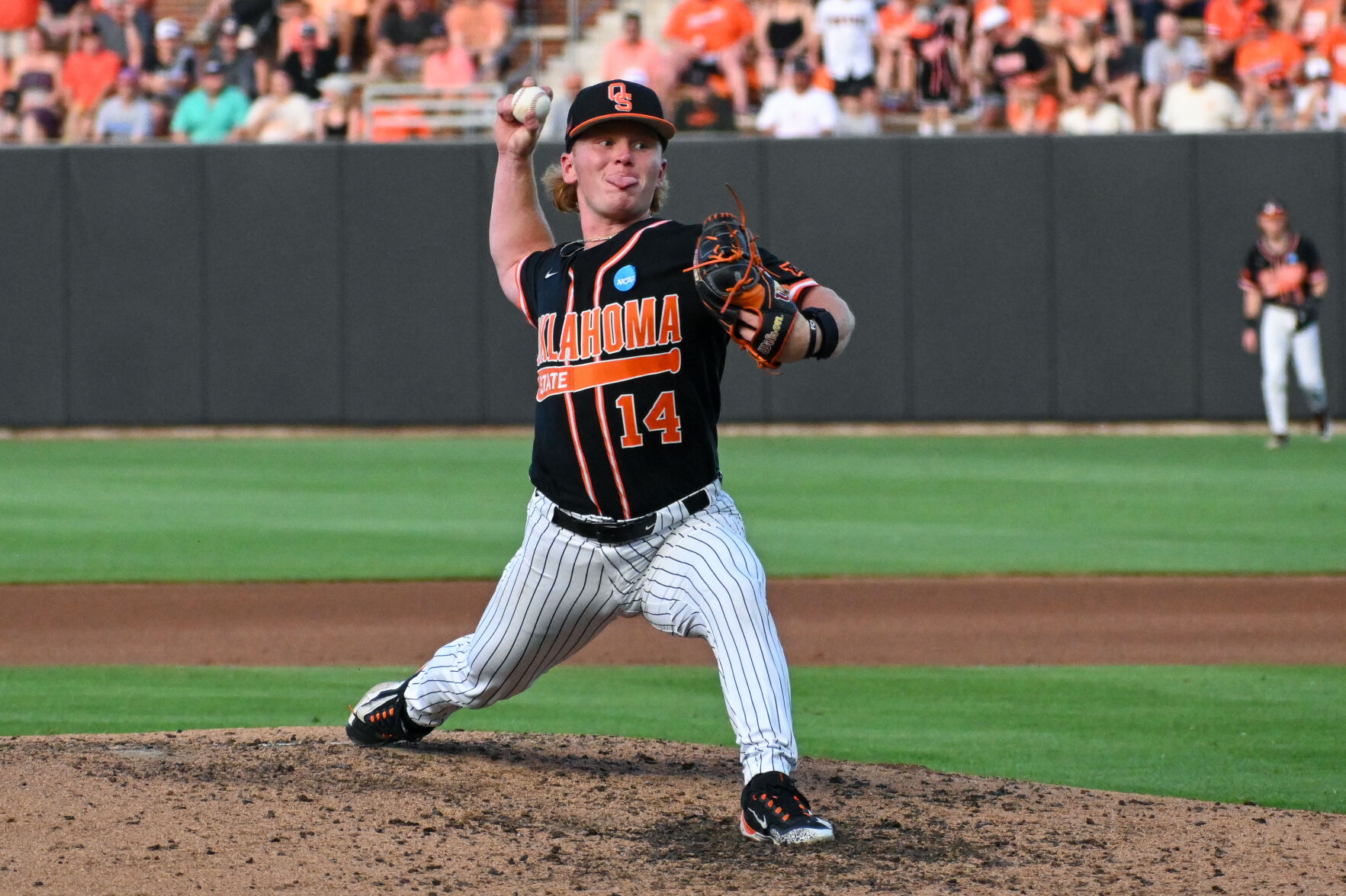 Brian Holiday tosses complete game in Cowboys' regional win over Gators ...