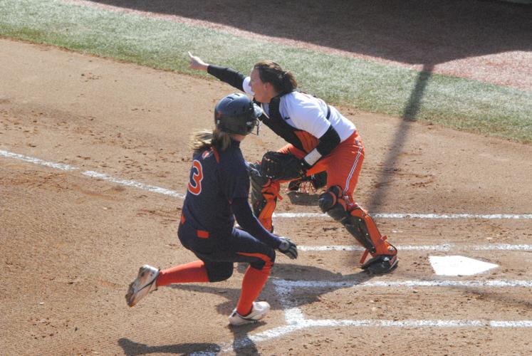 Oklahoma State's Julie Ward hits a two-run homer to help the Cowgirls ...