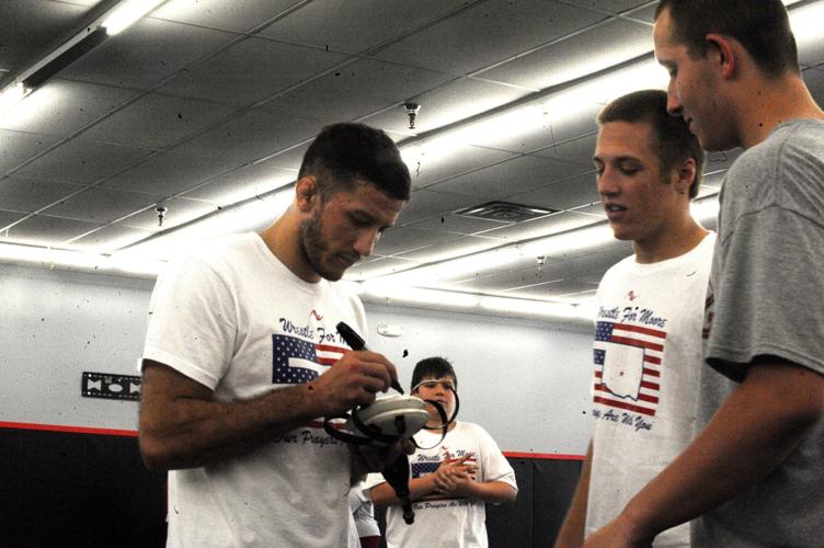 Oklahoma State, University of Oklahoma team up for wrestling clinic ...