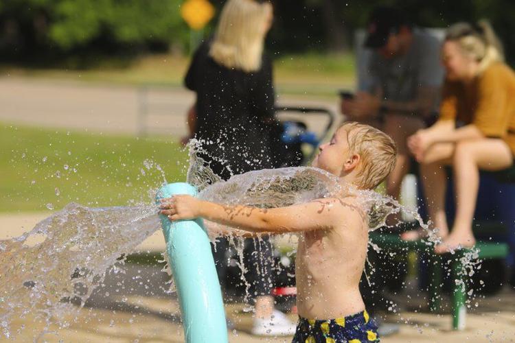 Local kids celebrate summer weather with trip to splash pads | News ...