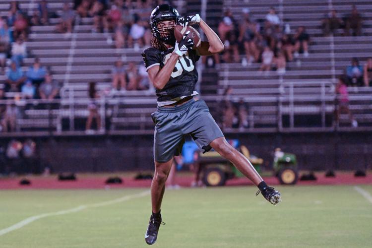 Under the LIghts: Perkins-Tryon holds first fall practice | Sports ...