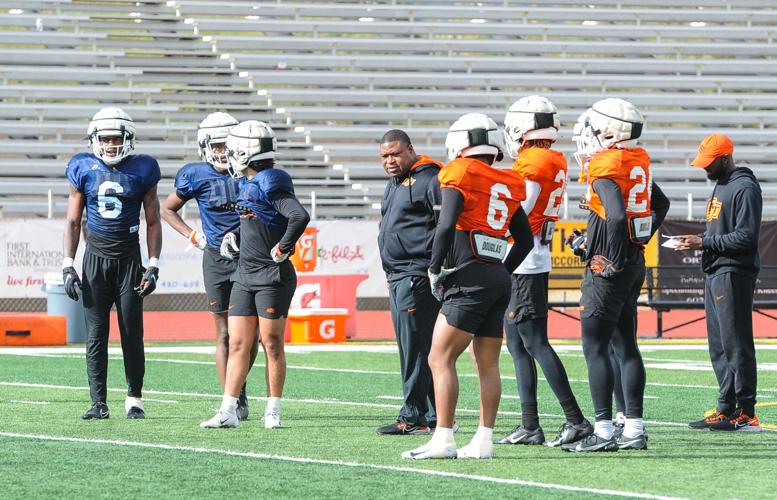 PHOTO GALLERY: Cowboys get in Fiesta Bowl practice amid cold, rainy ...