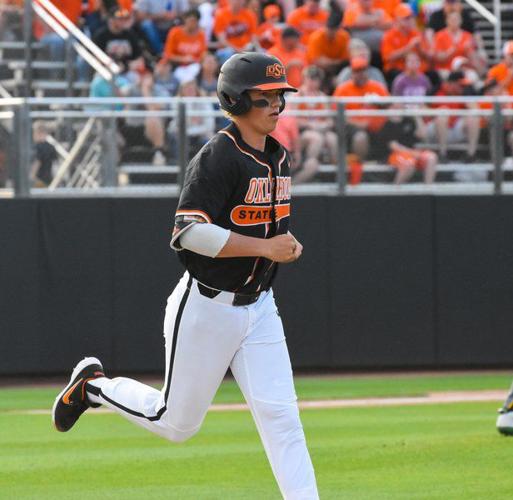 Elliott lights out late as Cowboys clinch series | OSU Sports ...