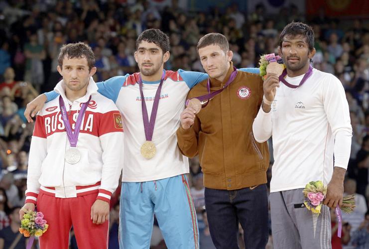 SLIDESHOW: Former Oklahoma State wrestler Coleman Scott wins bronze at ...
