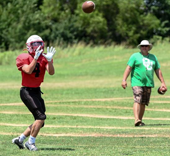 PHOTO GALLERY: Morrison football team gets to work under sweltering sun ...