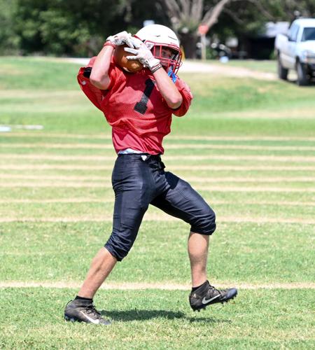 PHOTO GALLERY: Morrison football team gets to work under sweltering sun ...