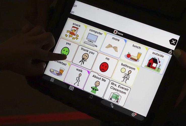 Will Rogers student with autism learning to speak with help of iPad ...