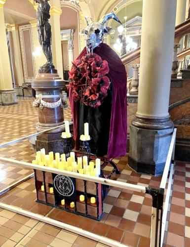 Kim Reynolds calls Iowa Capitol satanic display 'objectionable ...