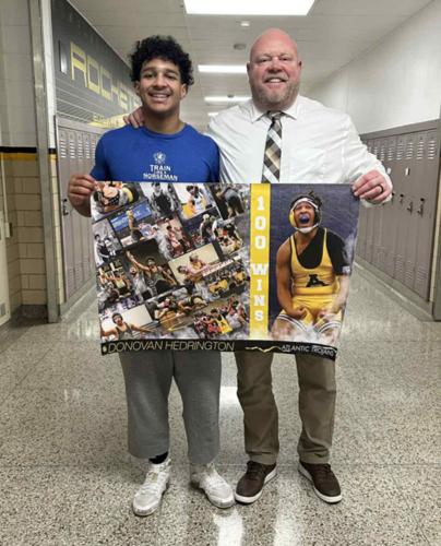 PREP WRESTLING: Hedrington wins 100th match as Trojans go 3-1 at EBF ...