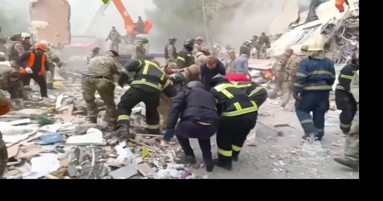 Search for survivors after apartment block collapses in Russia border ...