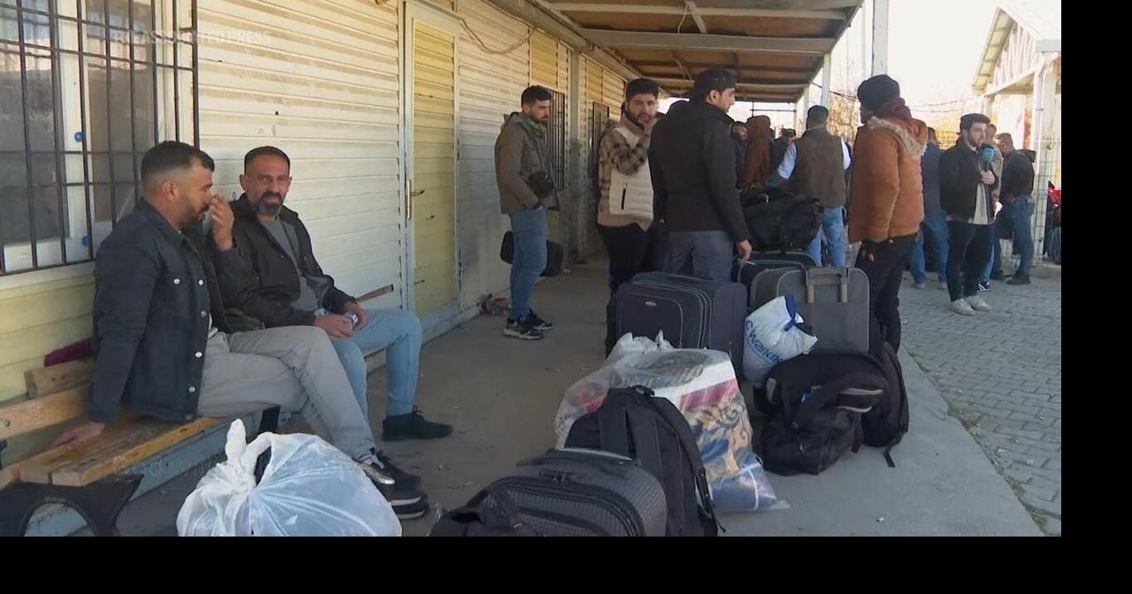 Syrian refugees wait at Turkish border, eager to return home after fall ...