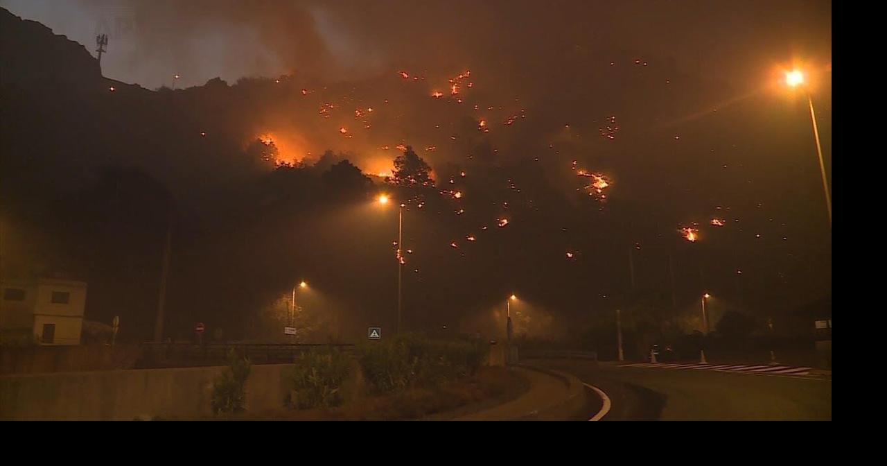 Advancing on three fronts, Madeira wildfire forces at least 100 people ...