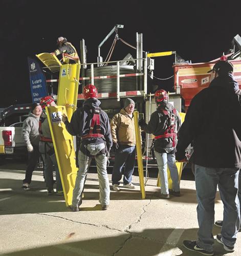 Getting the rescue tube ready | Atlantic | swiowanewssource.com