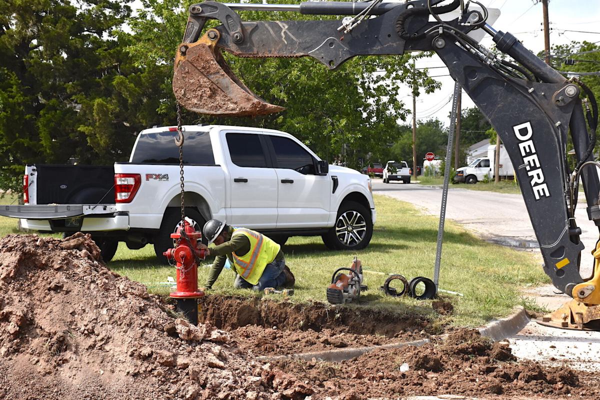 Putting in a hydrant | News | swoknews.com