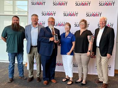 Great Plains Technology Center Superintendent Clarence Fortney receives ...