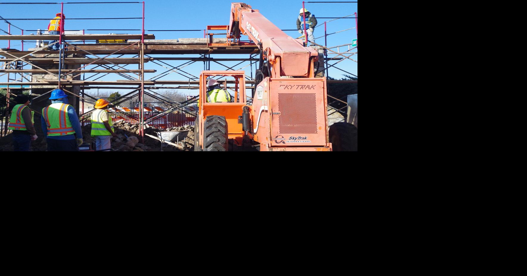 Rubble pile marks progress on Highland Cemetery's archway | News ...