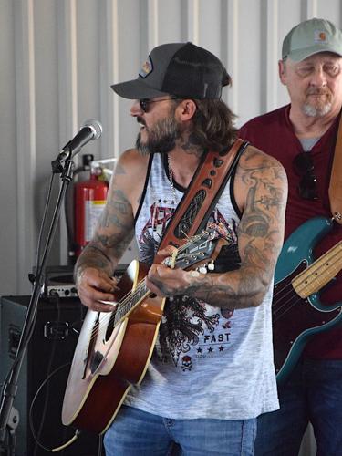 Playing music when and where he can is David Halliburton's plan | Photo ...