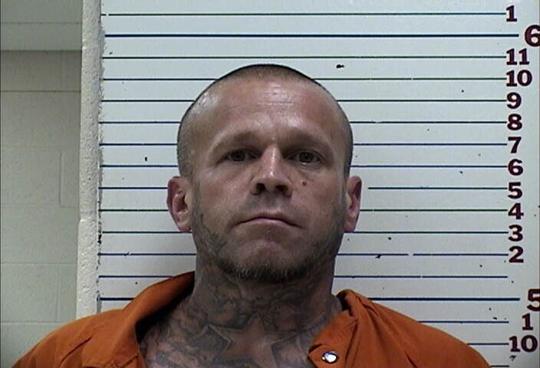 Swastika tattoo identifies serial protective order violator | News ...