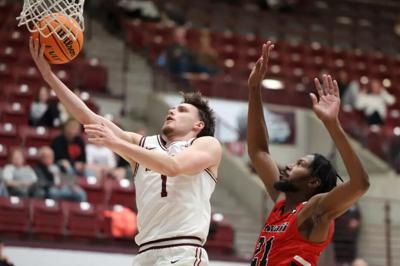 Kai Johnson's historic debut leads Griz to 92-61 win in season opener ...