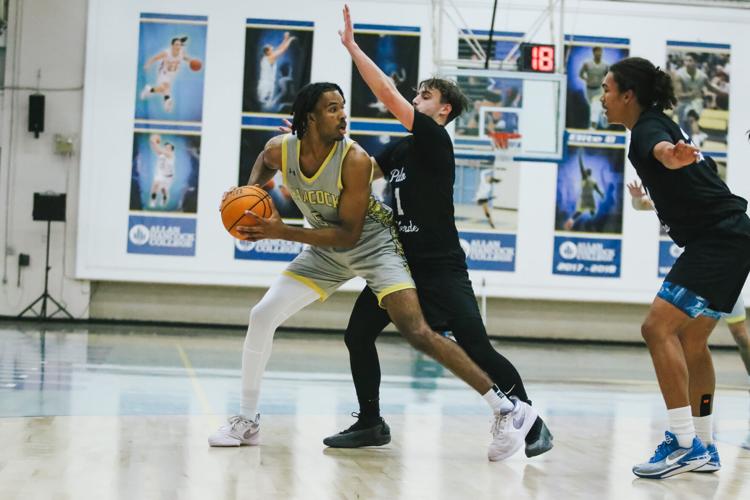 Hancock women win, men lose in basketball split | High School Sports ...