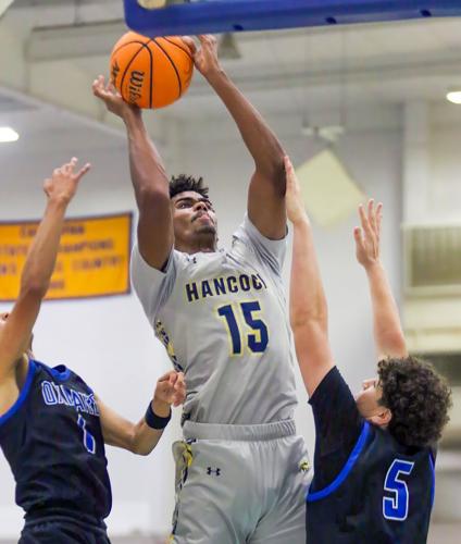 Hancock men’s basketball turns up second-half intensity, takes down ...