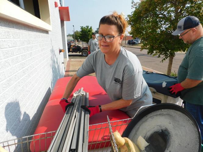 Volunteers spread across area for Day of Caring | News ...