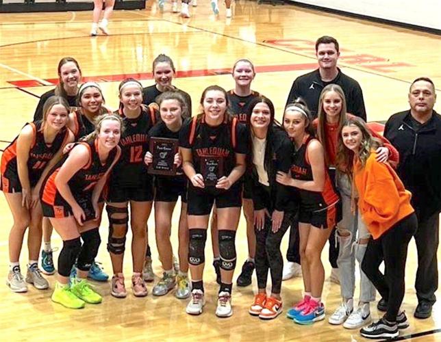 SPLIT IN SQUEAKERS: Tigers fall short, but Lady Tigers victorious ...