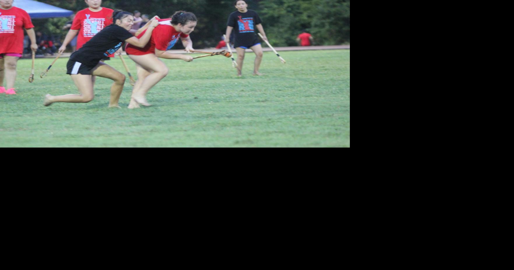 GALLERY: Players battle in community stick ball game at Cherokee ...