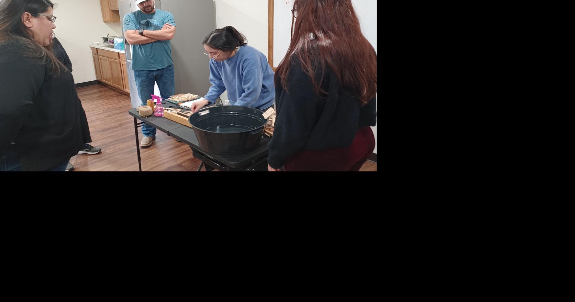 Laney Cully demonstrates how to weave a flat reed mat ...