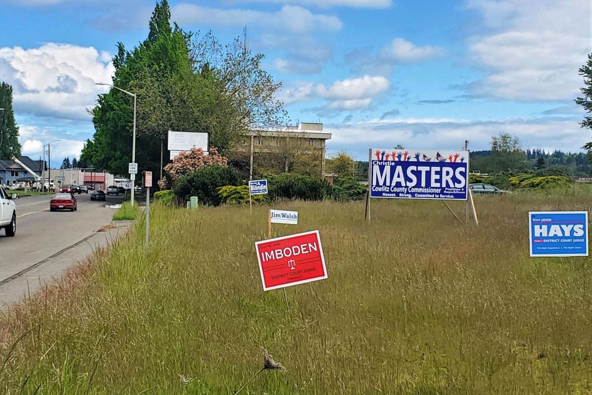 Campaign signs to come down after diking district buys Longview land