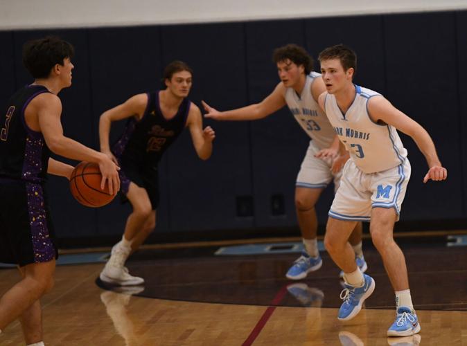 Youngest Mark Morris basketball coach steps up at age 19