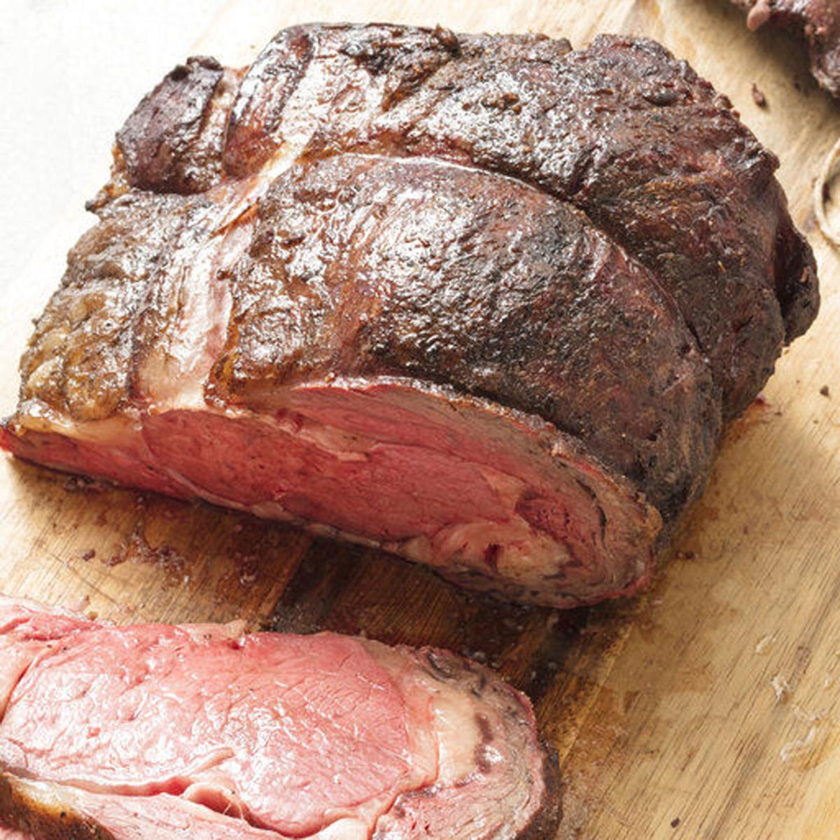 Use a grill to roast a prime rib for flavor and texture