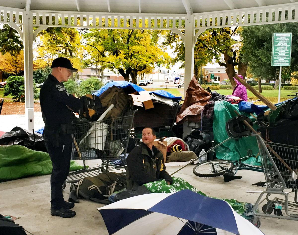 Police escort parks workers to gazebo after alleged threats from transients