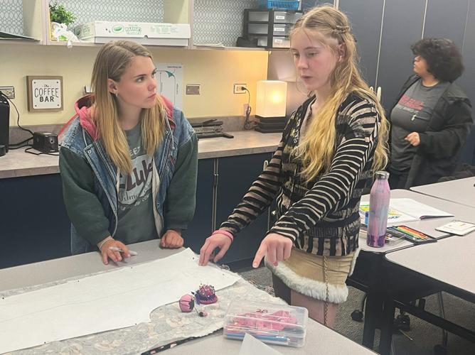 Kelso students create dresses from newspaper