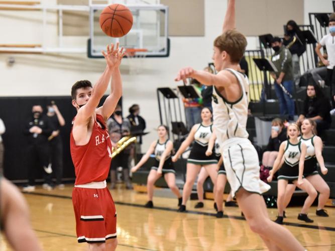 2A Boys Basketball: R.A. Long staves off upset at Woodland