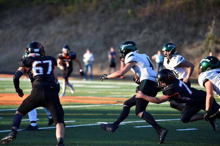 Prep Football: Old McDonald marches into Kalama and nets Woodland a win