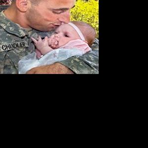 Kelso soldier returns home to see new daughter for the first time