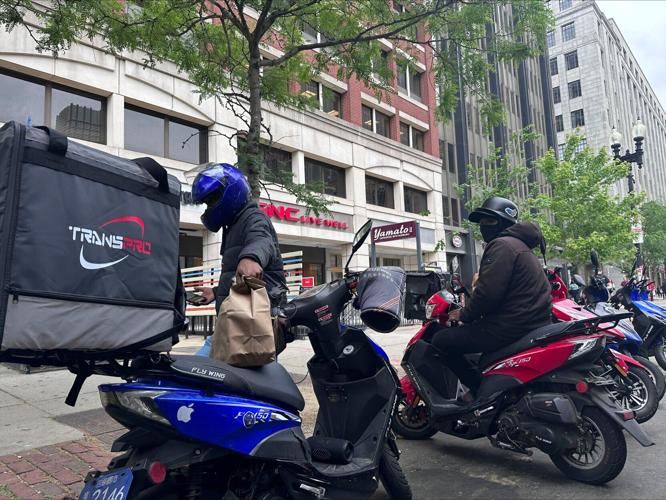 Big US cities cracking down on food delivery drivers