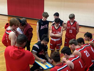 2A High School Boys Basketball: R.A. Long wins the hard way at Woodland