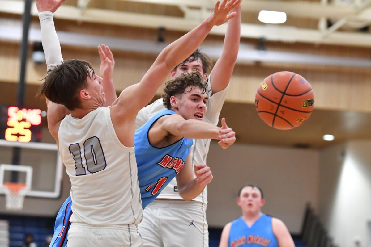 High School Boys Basketball: Mark Morris' Braydon Olson signs with ...